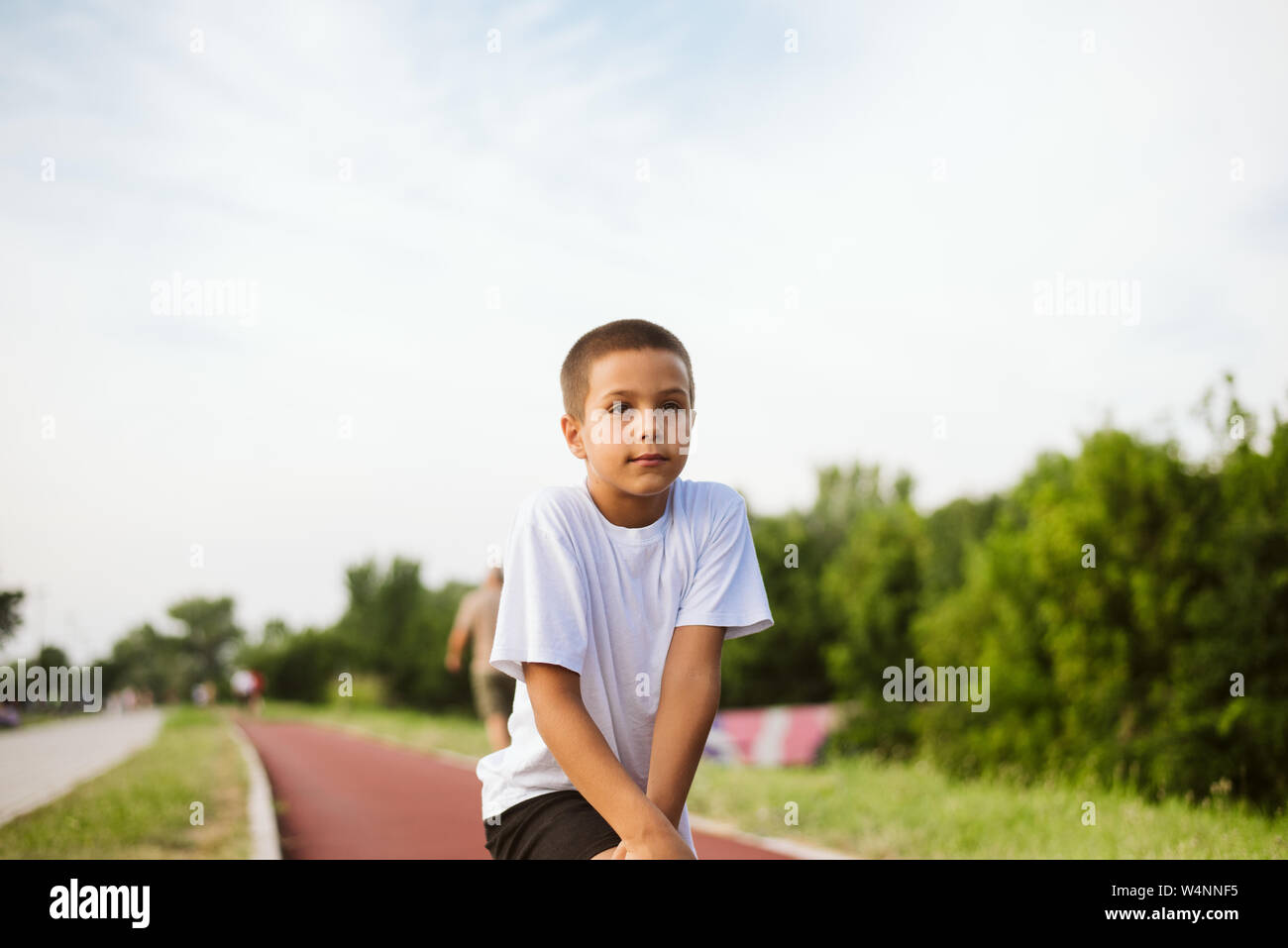 7 year old child is training to pull up on the horizontal bar. Emotions ...