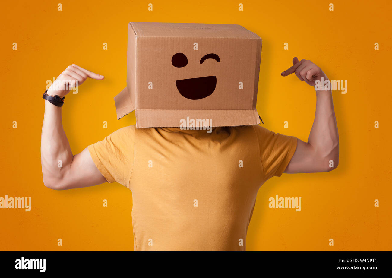Funny man wearing cardboard box on his head with smiley face Stock ...