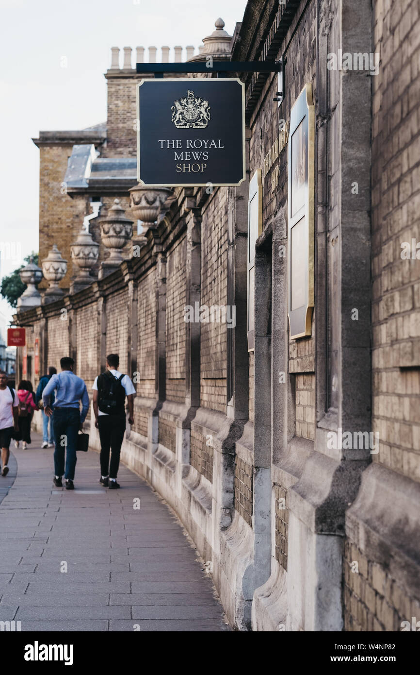 London, UK - July 15, 2019: People walk past the Royal Mews Shop at ...