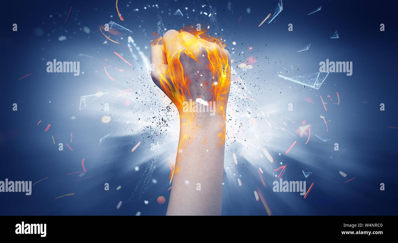Hand hits strongly and makes fire beam around Stock Photo - Alamy