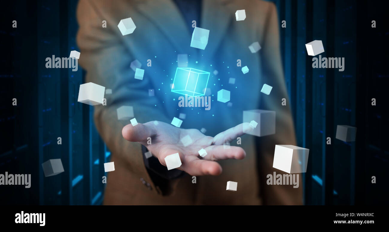 Person holding hologram projection displaying white cubes in server ...