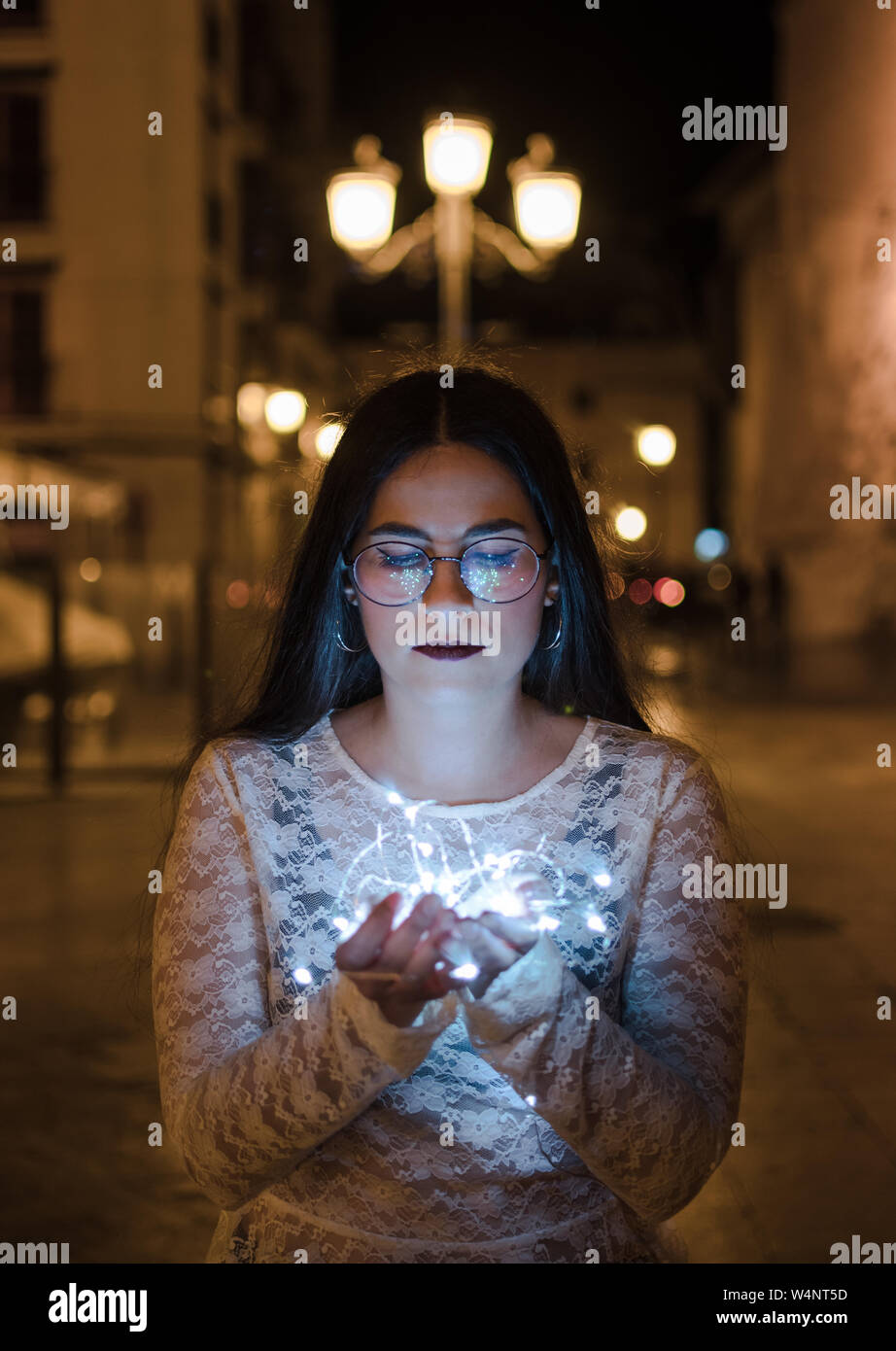 Girl looking at city night lights hi-res stock photography and images ...