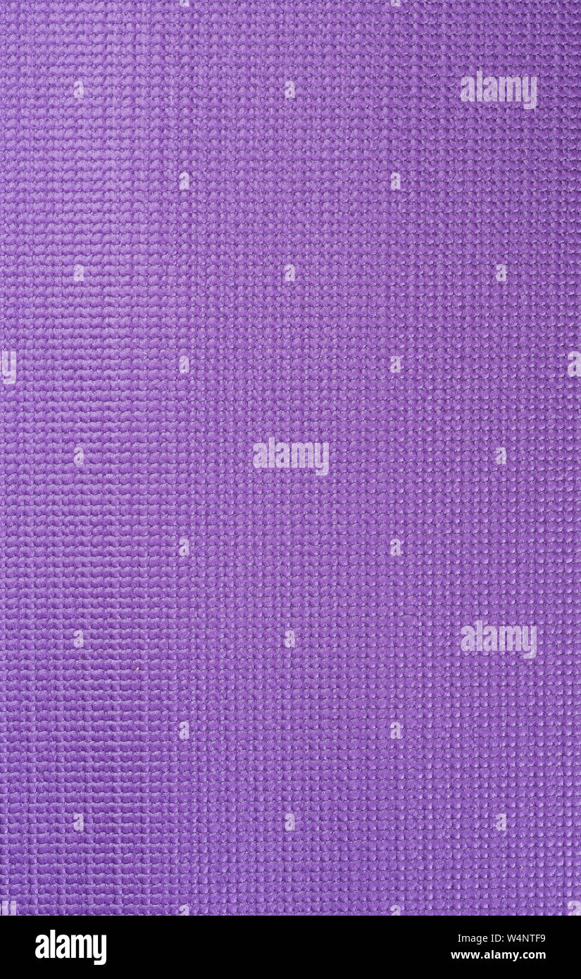 Texture of a violet gym mat. Yoga mat texture. Close up Stock Photo - Alamy