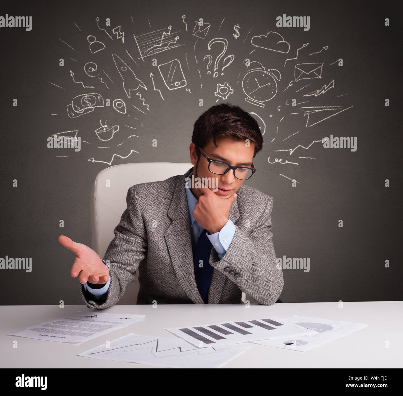 Manager in front of the office desk with different direction concept ...