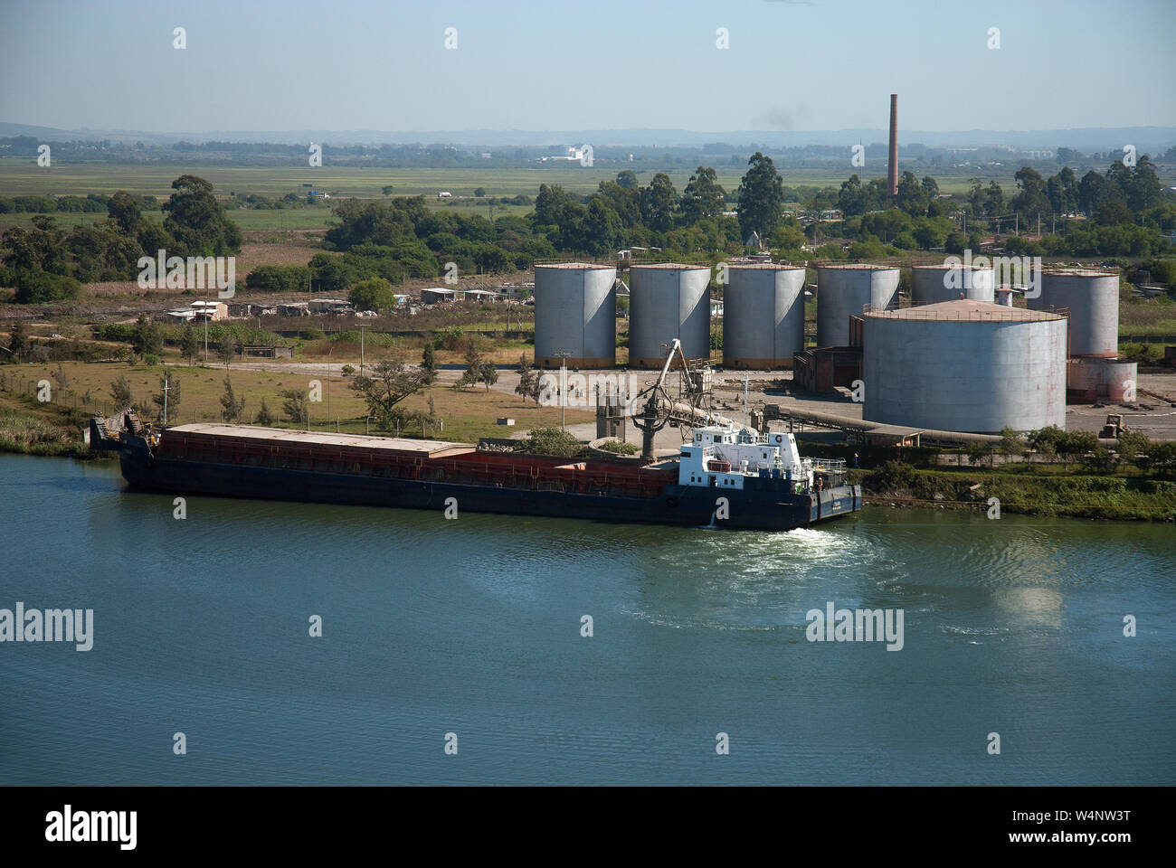 2006 aerial photo of barge carrying rice sailing through the hi-res ...