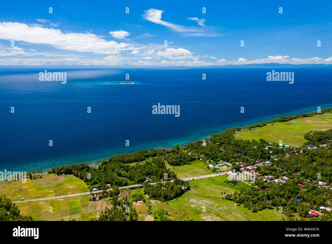 Aerial view of the island of Camiguin with Mantigue island in the ...