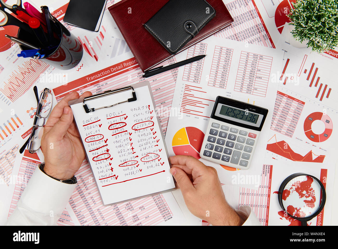 Business reports, data tables and charts - directly above view of ...