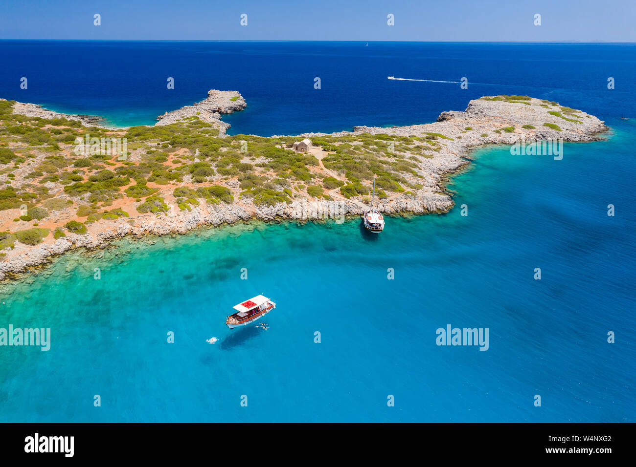 Aerial drone view of traditional Greek wooden boats floating on the ...