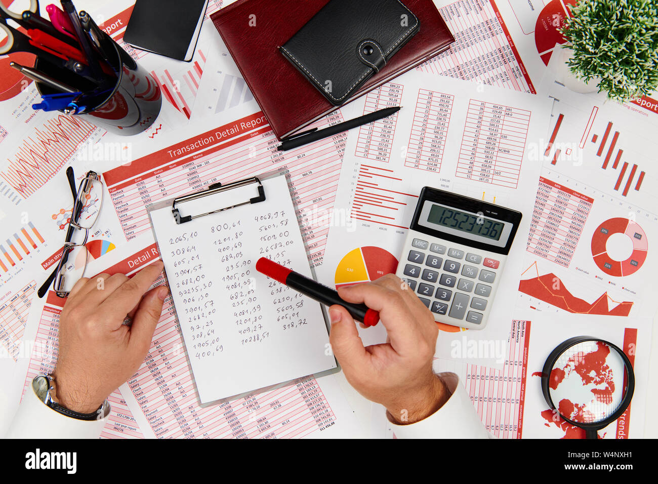 Business reports, data tables and charts - directly above view of ...