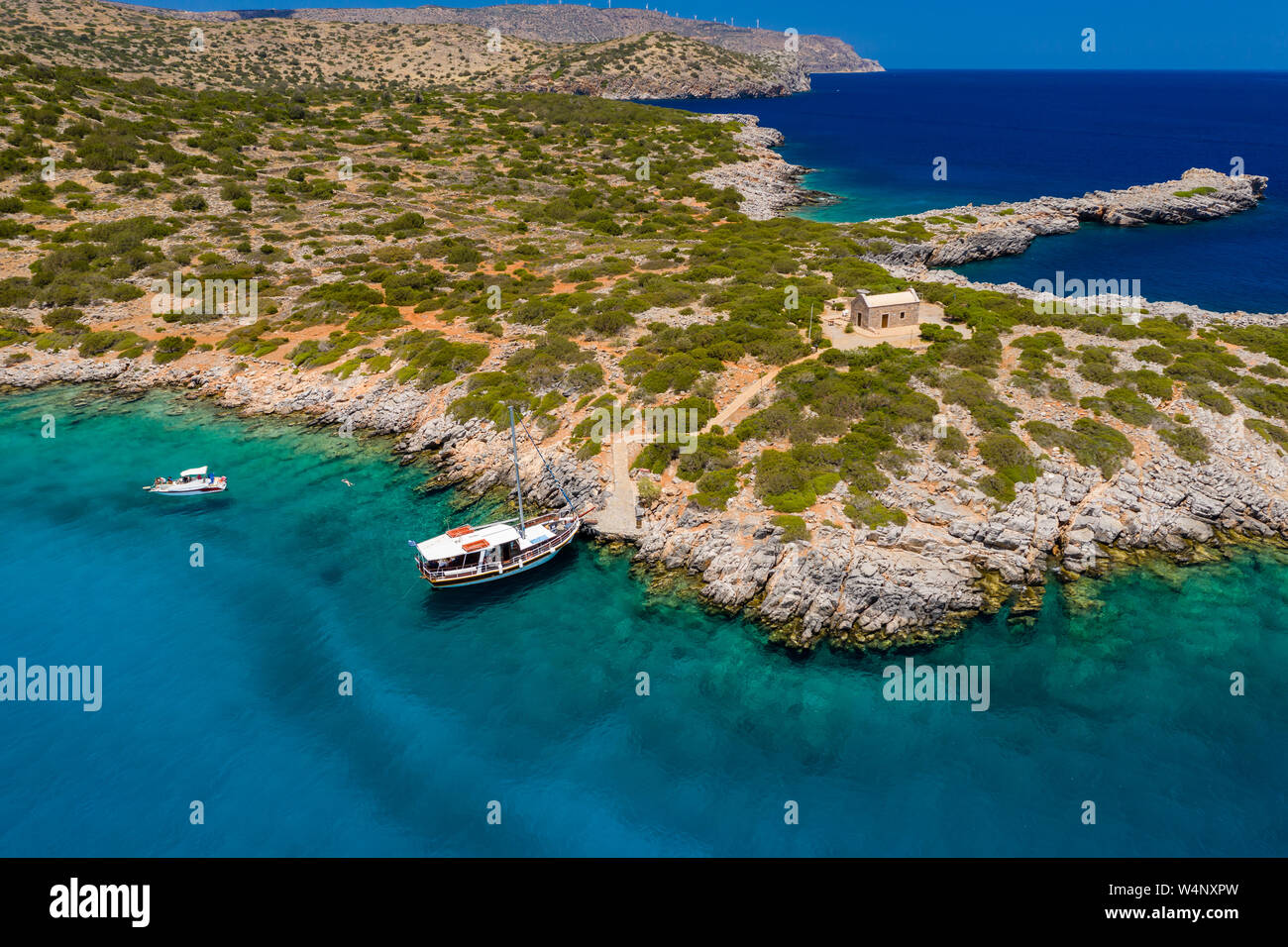 Aerial drone view of traditional Greek wooden boats floating on the ...
