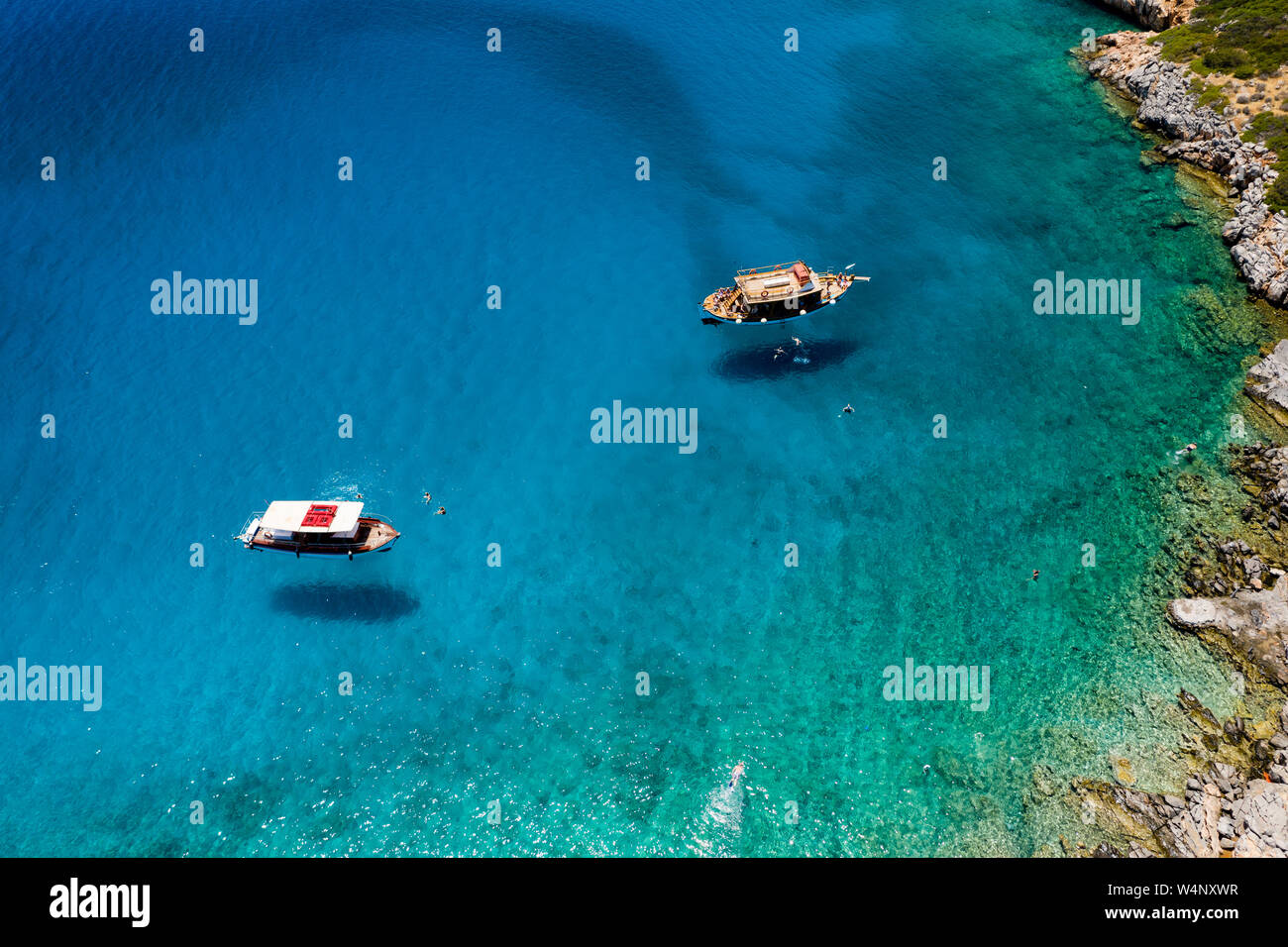 Aerial drone view of traditional Greek wooden boats floating on the ...