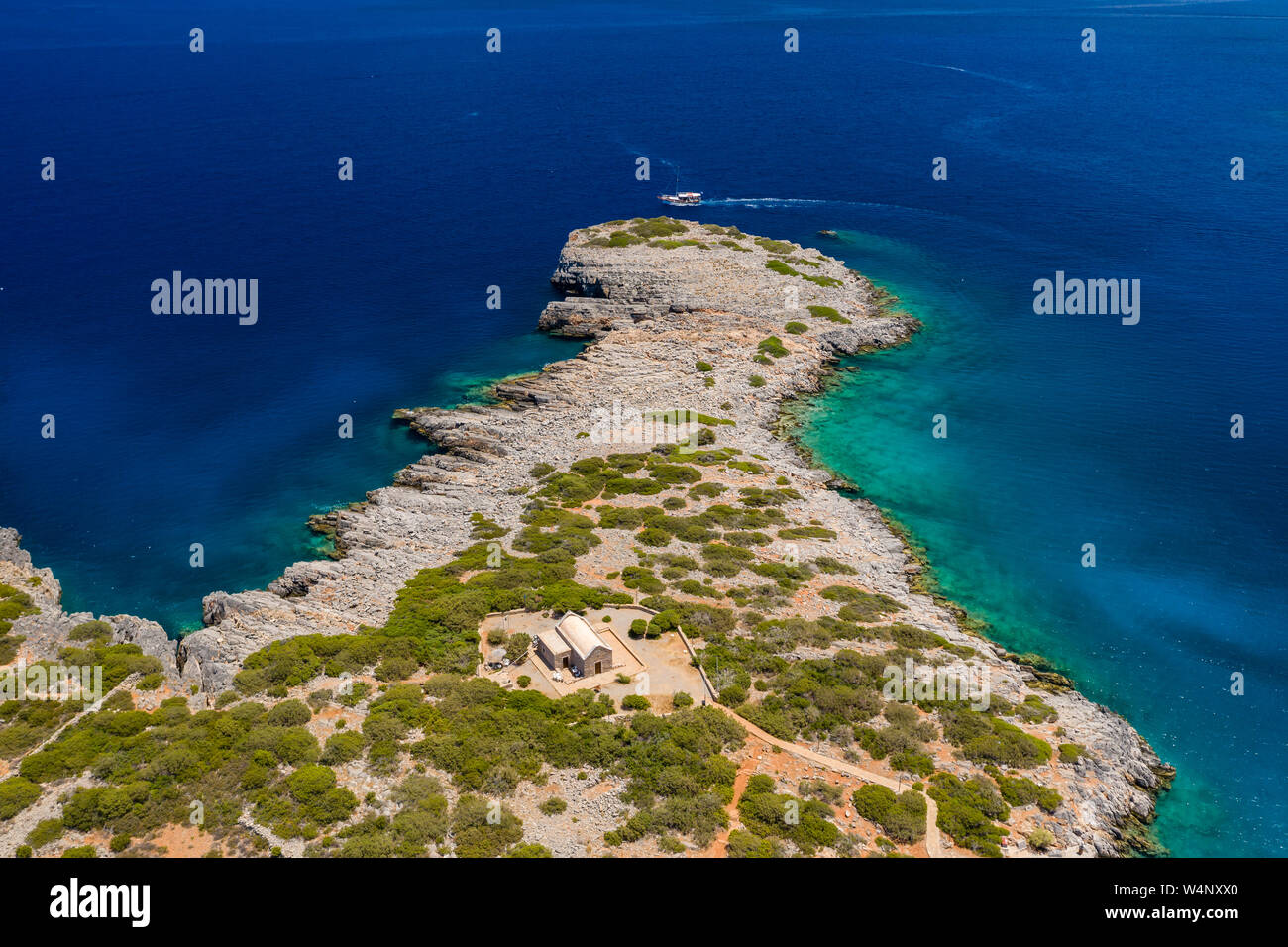 Aerial drone view of the dry summer coastline and crystal clear waters ...