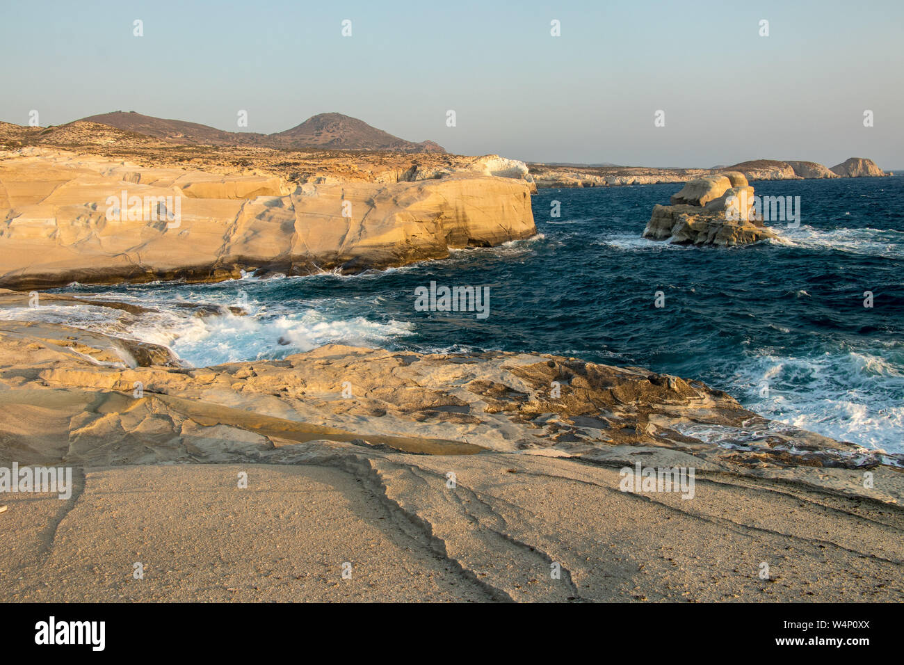 White volcanic cliffs in Sarakíniko beach, Milos island Stock Photo - Alamy