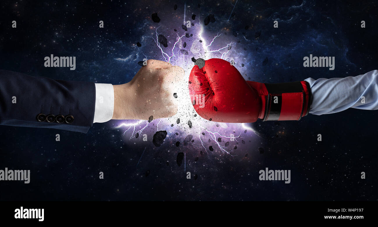 Two hands fighting with storm explosion concept Stock Photo - Alamy