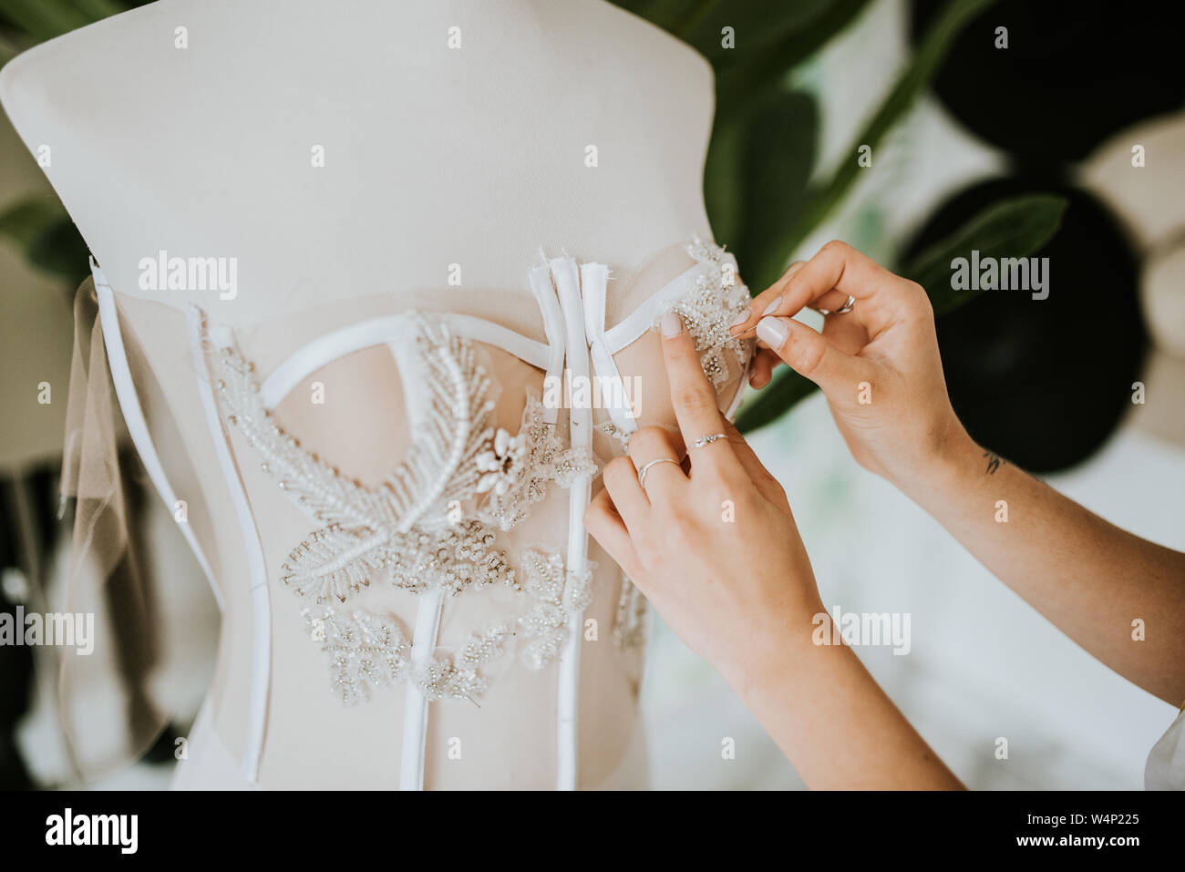 Person sewing clothes close up hi-res stock photography and images - Alamy