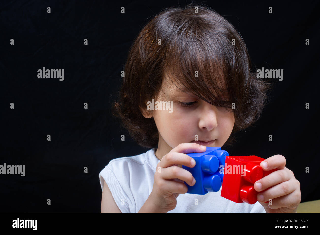 Children hands play with colorful building blocks lego blocks Stock ...