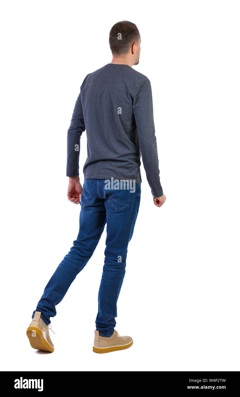 Back view of going handsome man . walking young guy . Rear view people ...