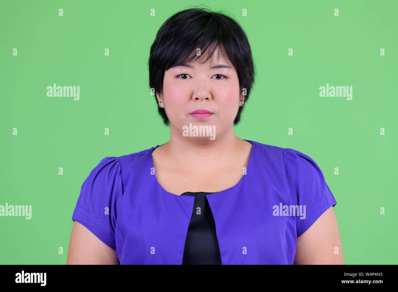 Face of young beautiful overweight Asian woman Stock Photo - Alamy