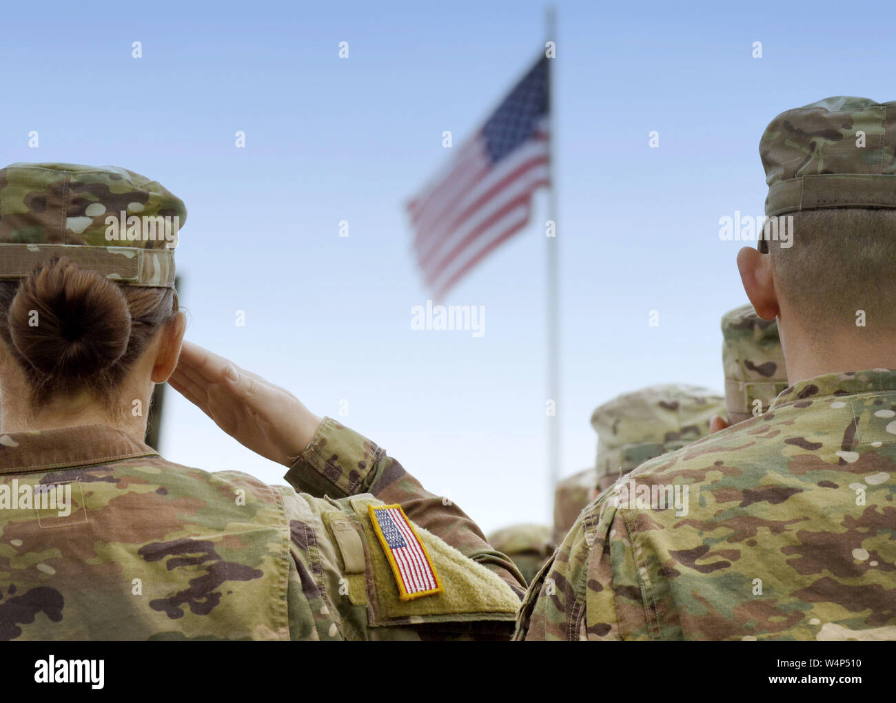 Saluting the us flag hi-res stock photography and images - Alamy