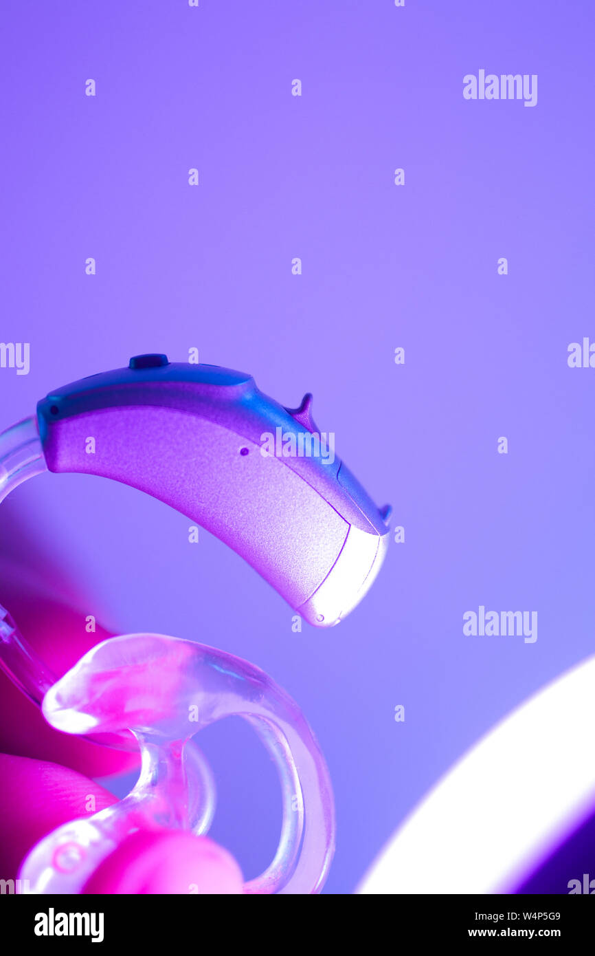 Modern digital hearing aid for deafness and deaf people Stock Photo - Alamy