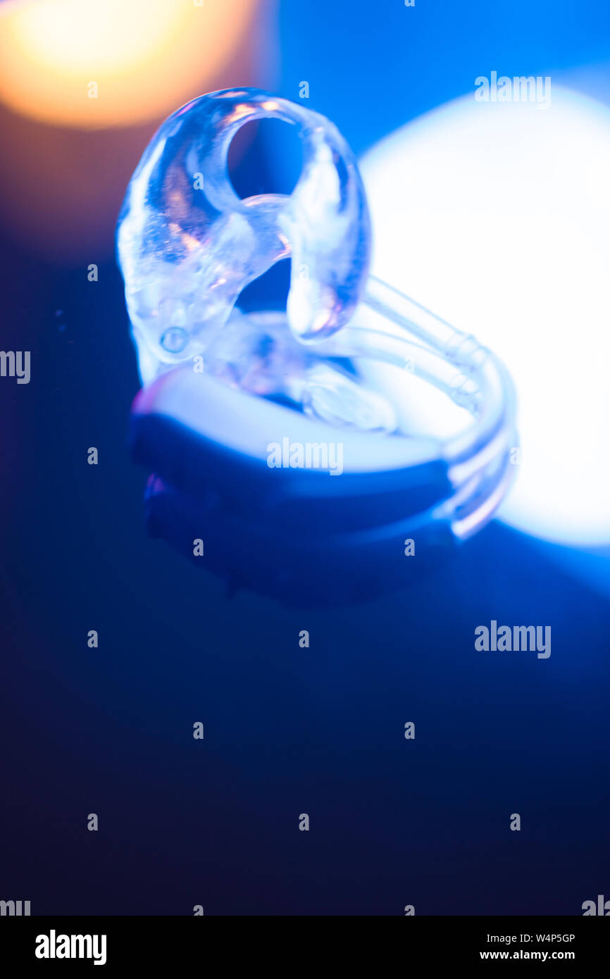 Modern digital hearing aid for deafness and deaf people Stock Photo - Alamy