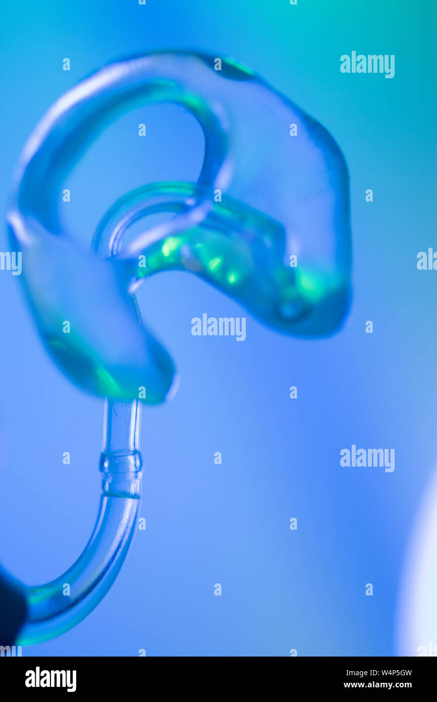 Modern digital hearing aid for deafness and deaf people Stock Photo - Alamy