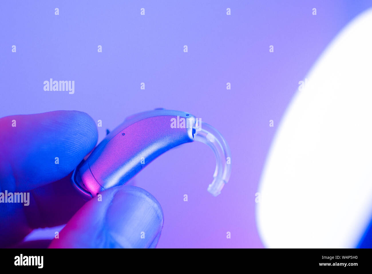 Modern digital hearing aid for deafness and deaf people Stock Photo - Alamy
