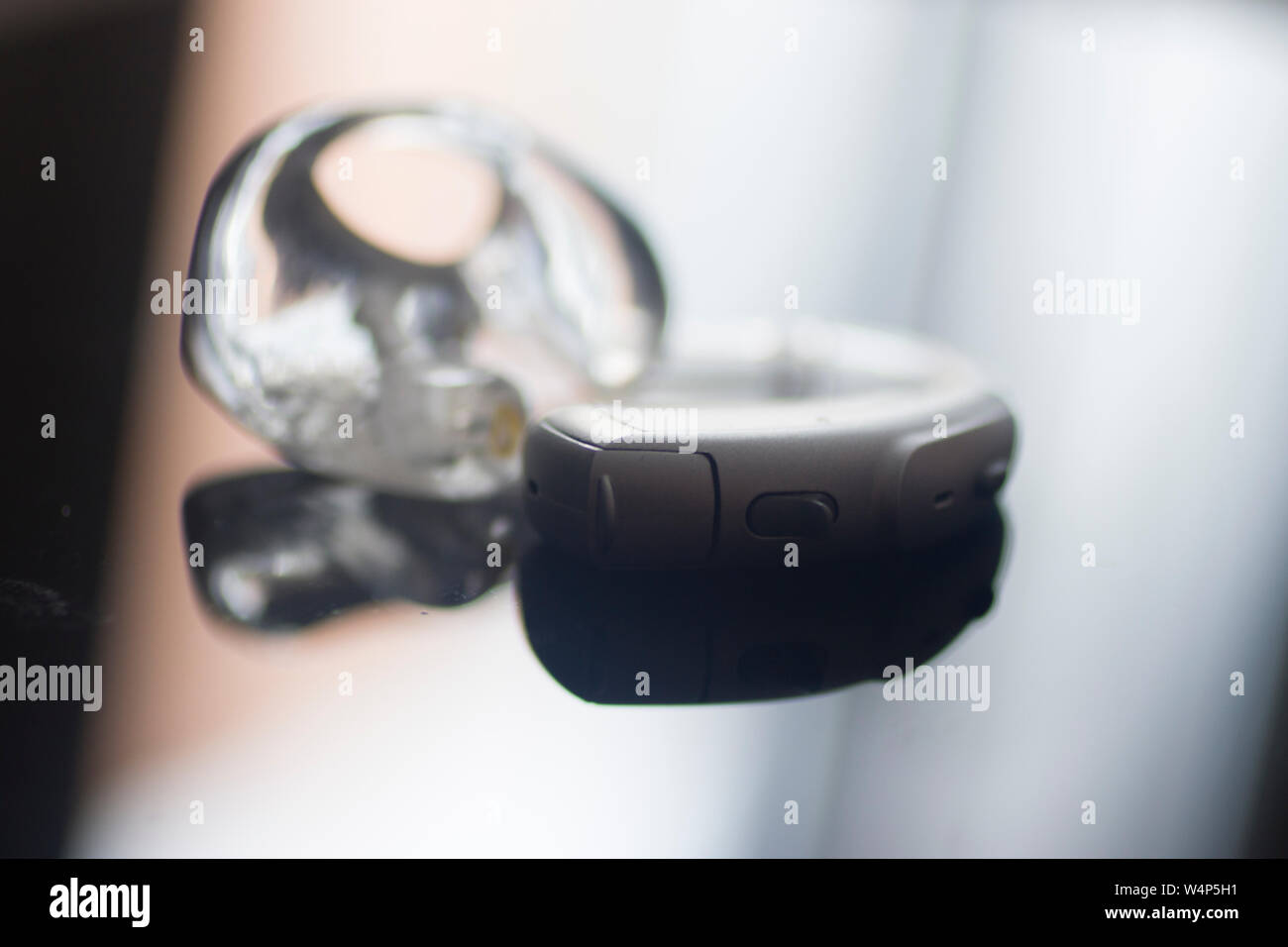 Modern digital hearing aid for deafness and deaf people Stock Photo - Alamy