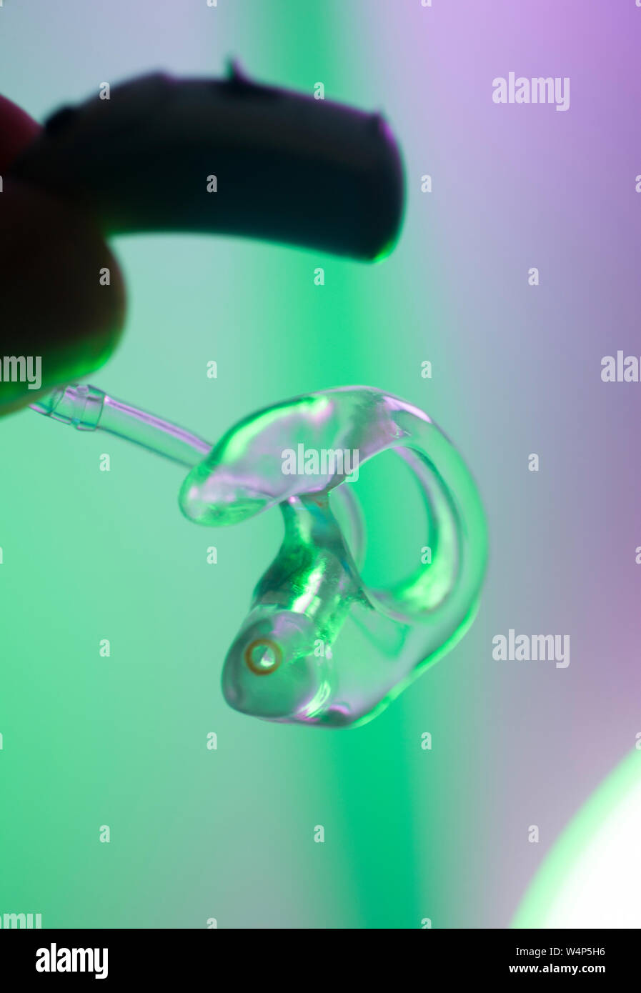 Modern digital hearing aid for deafness and deaf people Stock Photo - Alamy