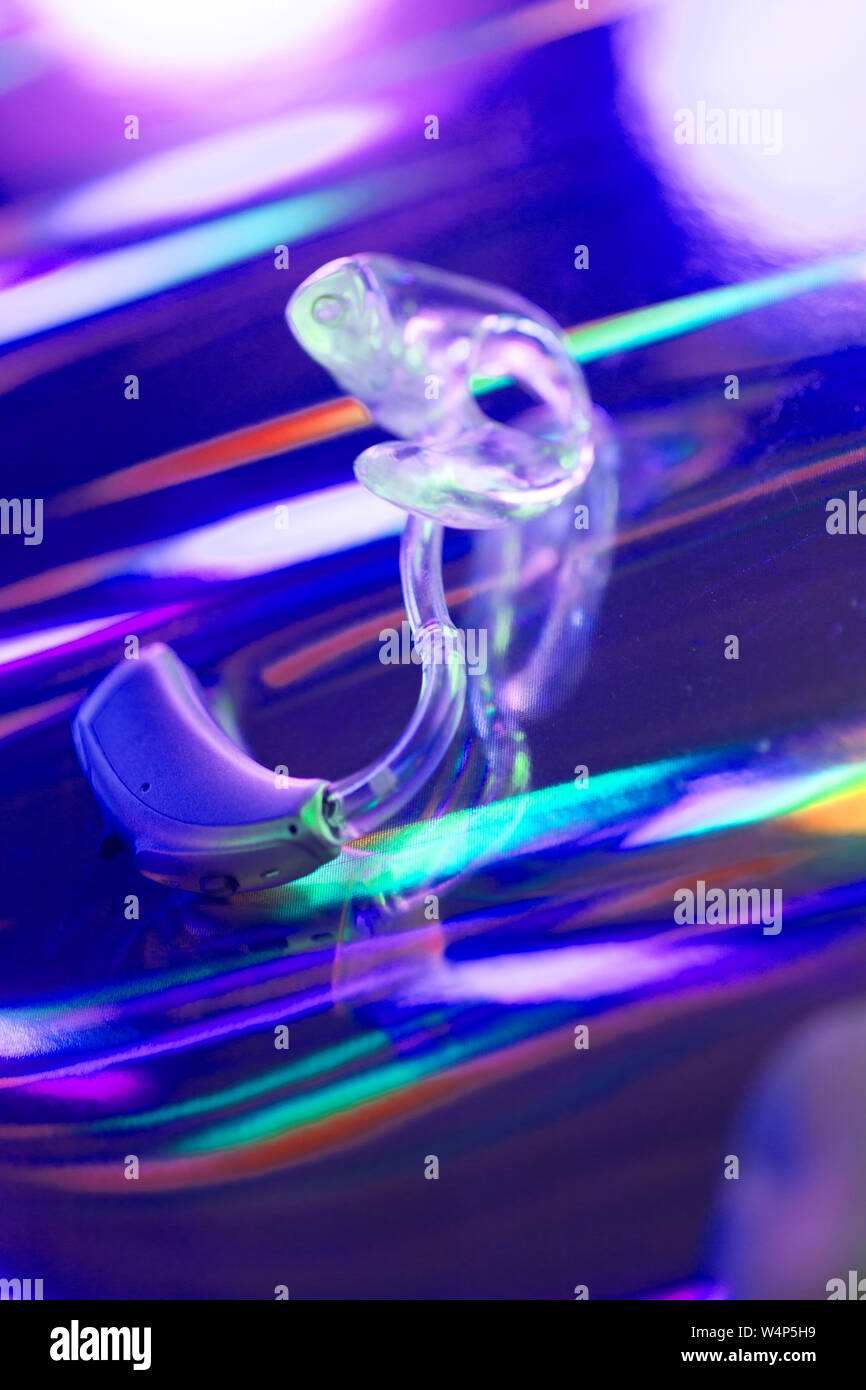 Modern digital hearing aid for deafness and deaf people Stock Photo - Alamy
