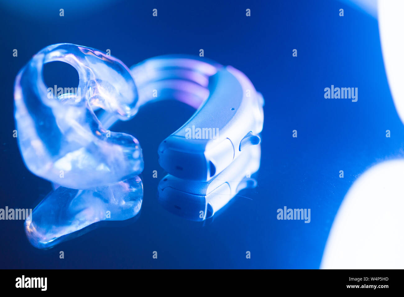 Modern digital hearing aid for deafness and deaf people Stock Photo - Alamy