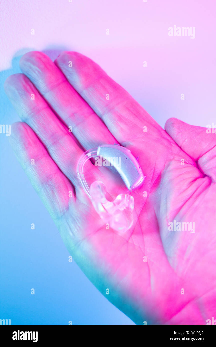 Modern digital hearing aid for deafness and deaf people Stock Photo - Alamy