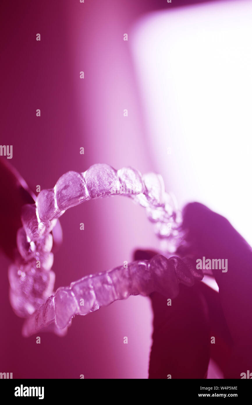 Clear dental teeth retainer brackets to straighten and align each tooth ...