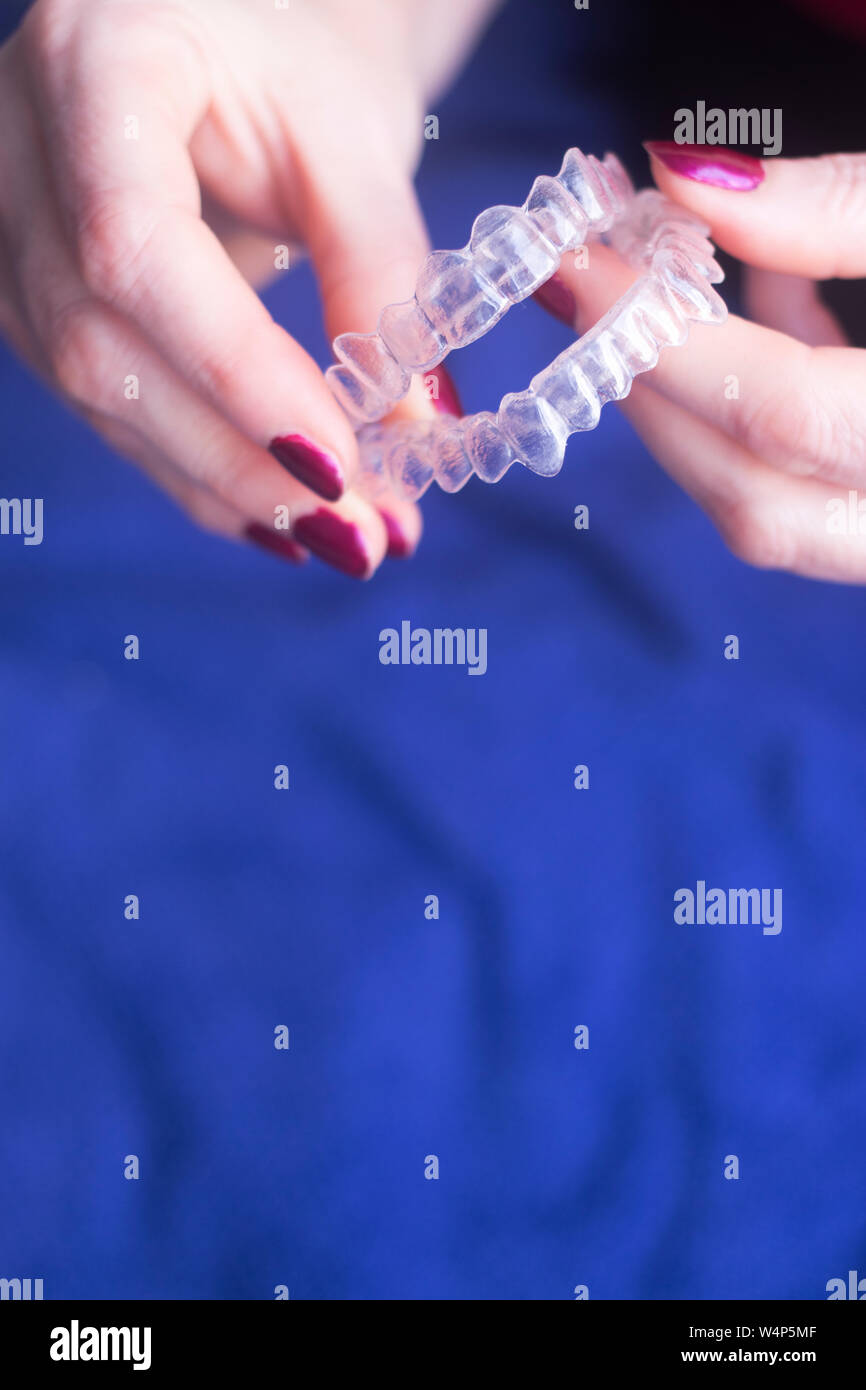 Clear dental teeth retainer brackets to straighten and align each tooth ...