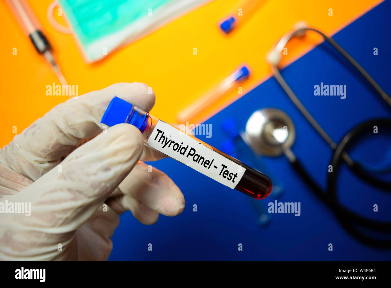 Thyroid Panel - Test with blood sample. Top view isolated on color ...
