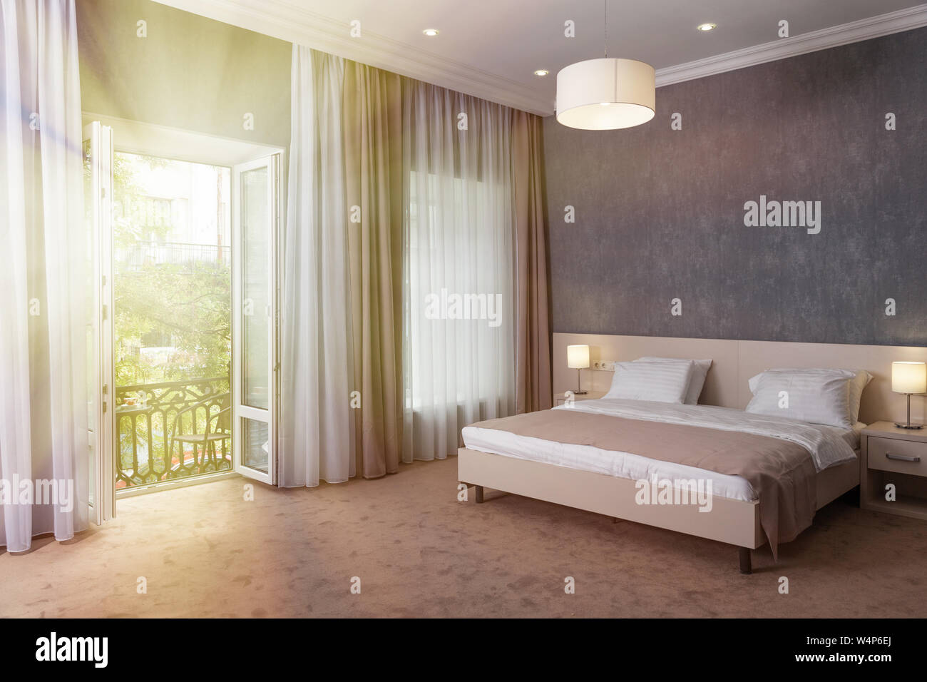 Interior of a cozy hotel room, bedroom Stock Photo - Alamy