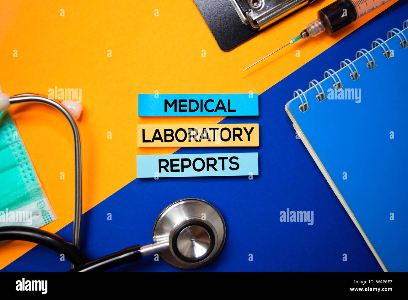 Medical Laboratory Reports text on Sticky Notes. Top view isolated on ...