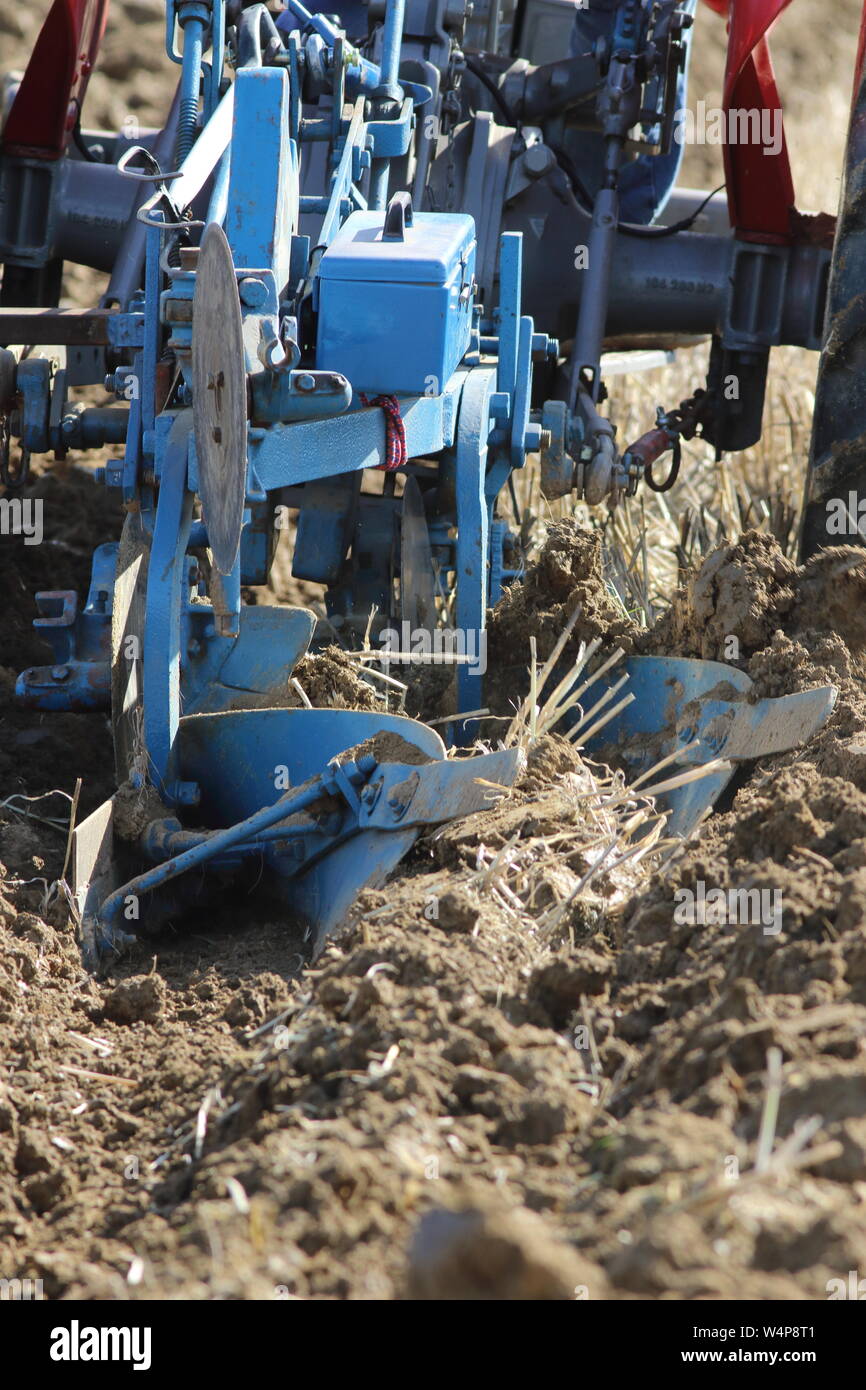 Tractor ploughing soil hi-res stock photography and images - Alamy