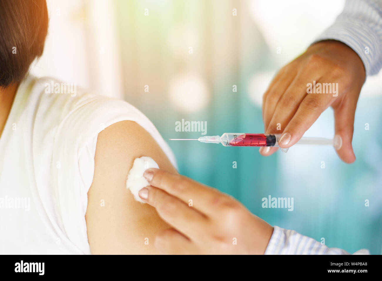 Vaccination of children by injection needle nurses are vaccinations to ...