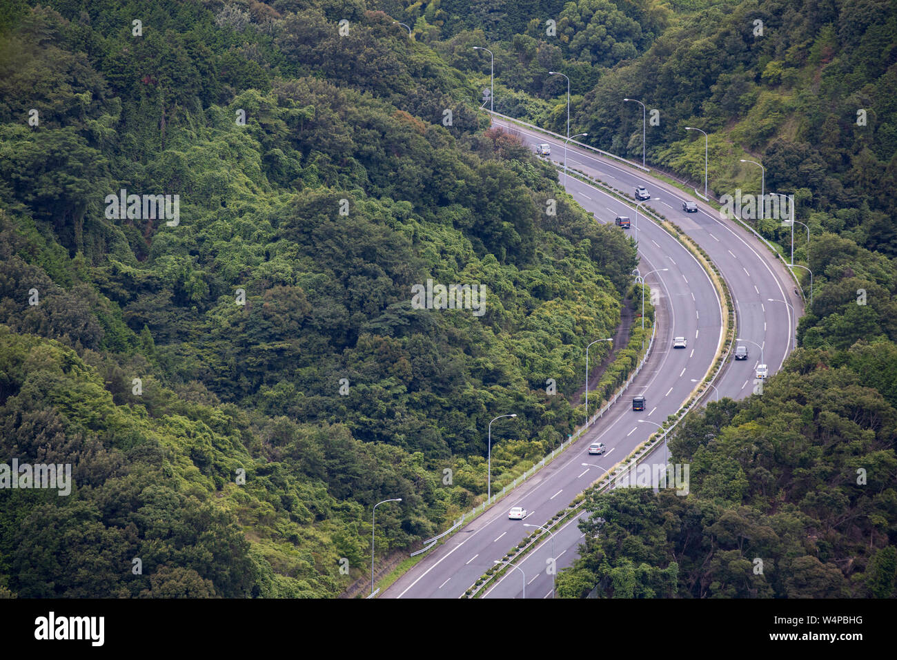 Aerial view of highway through forested mountains of Japan Stock Photo ...