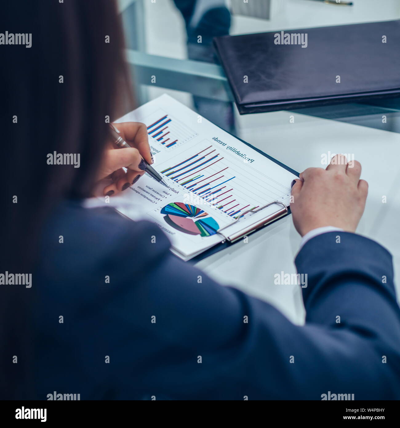 closeup of business team discussing financial charts on a workplace in ...