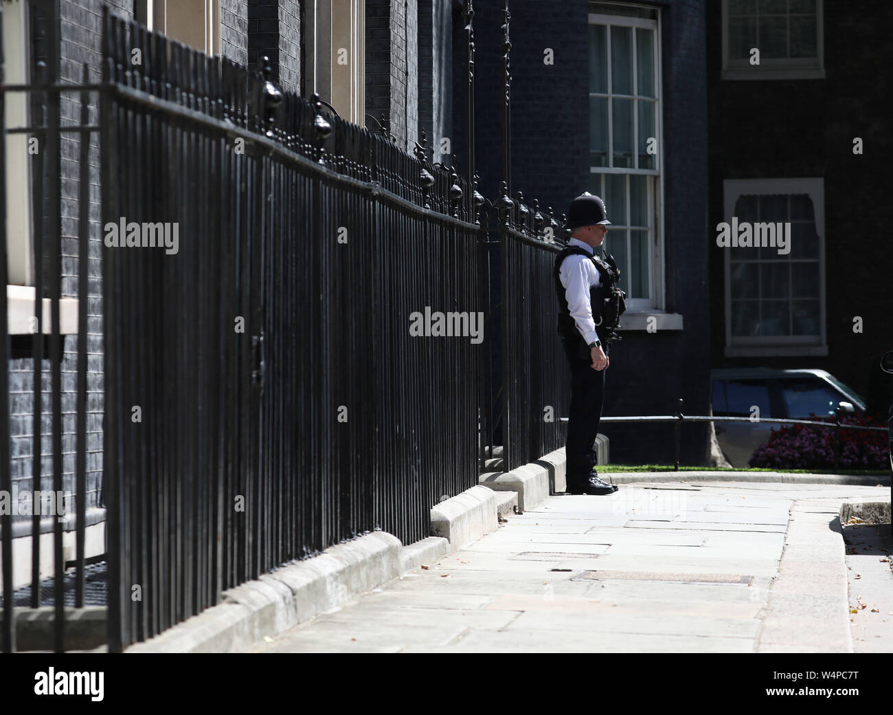 London, UK. 24th July, 2019. A policeman stands outside Number 10 ...