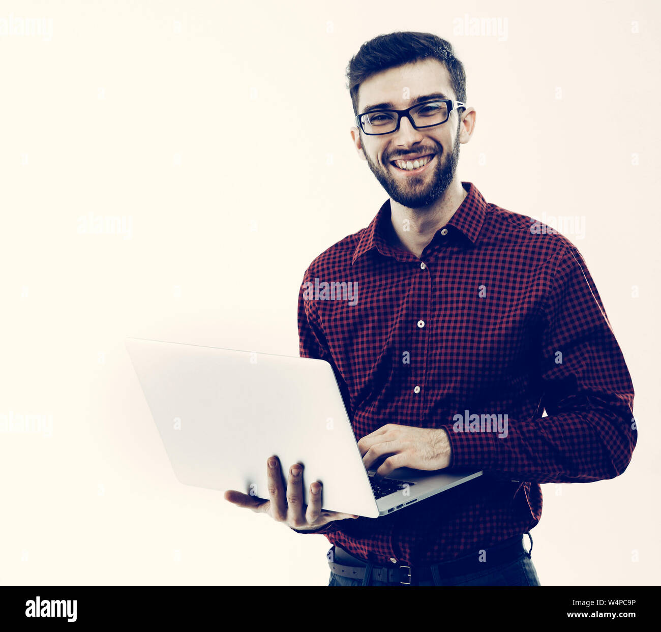 system administrator with a laptop against white background.the photo ...