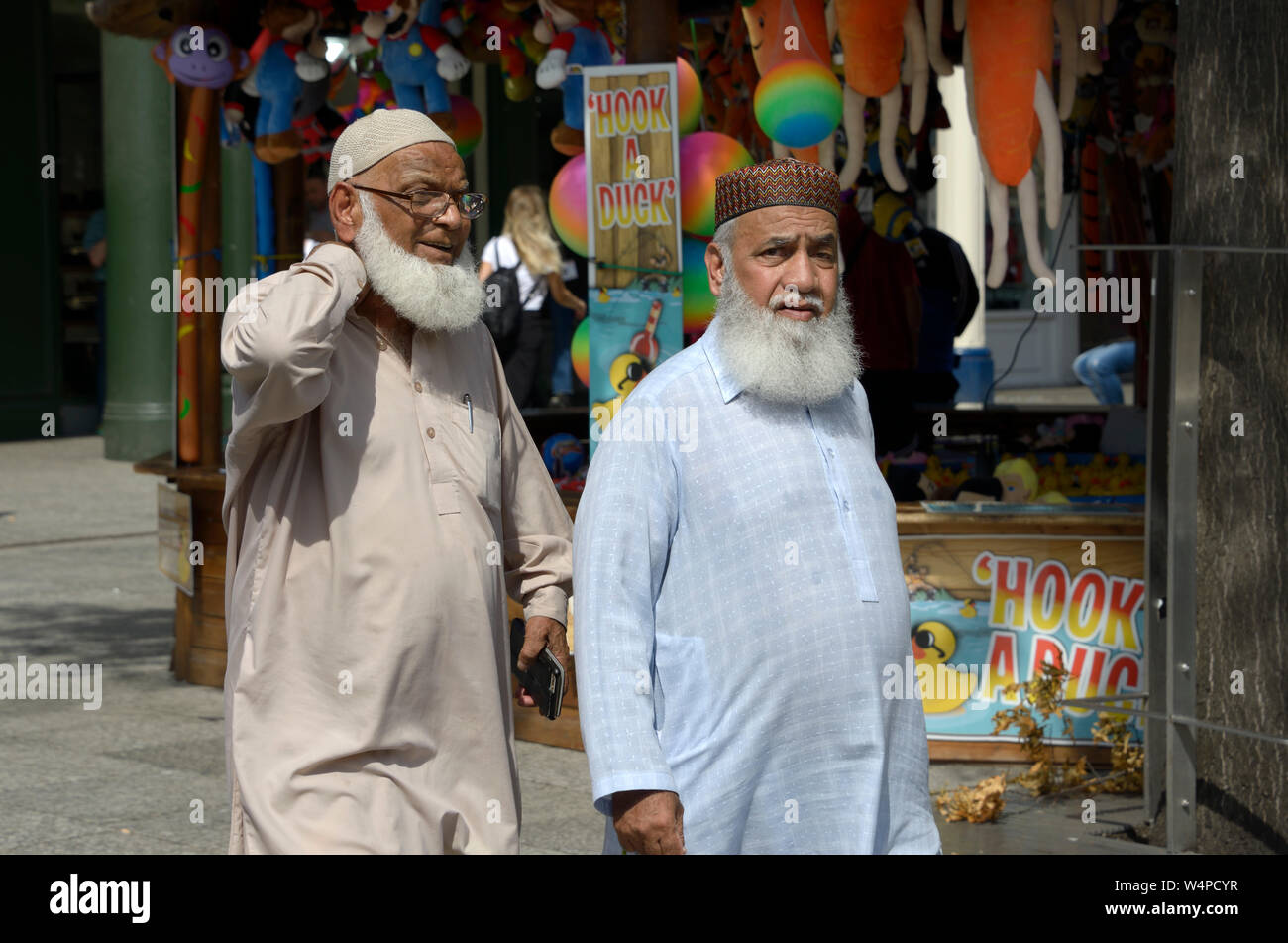 Old Muslim men with beards, out in the heat Stock Photo - Alamy