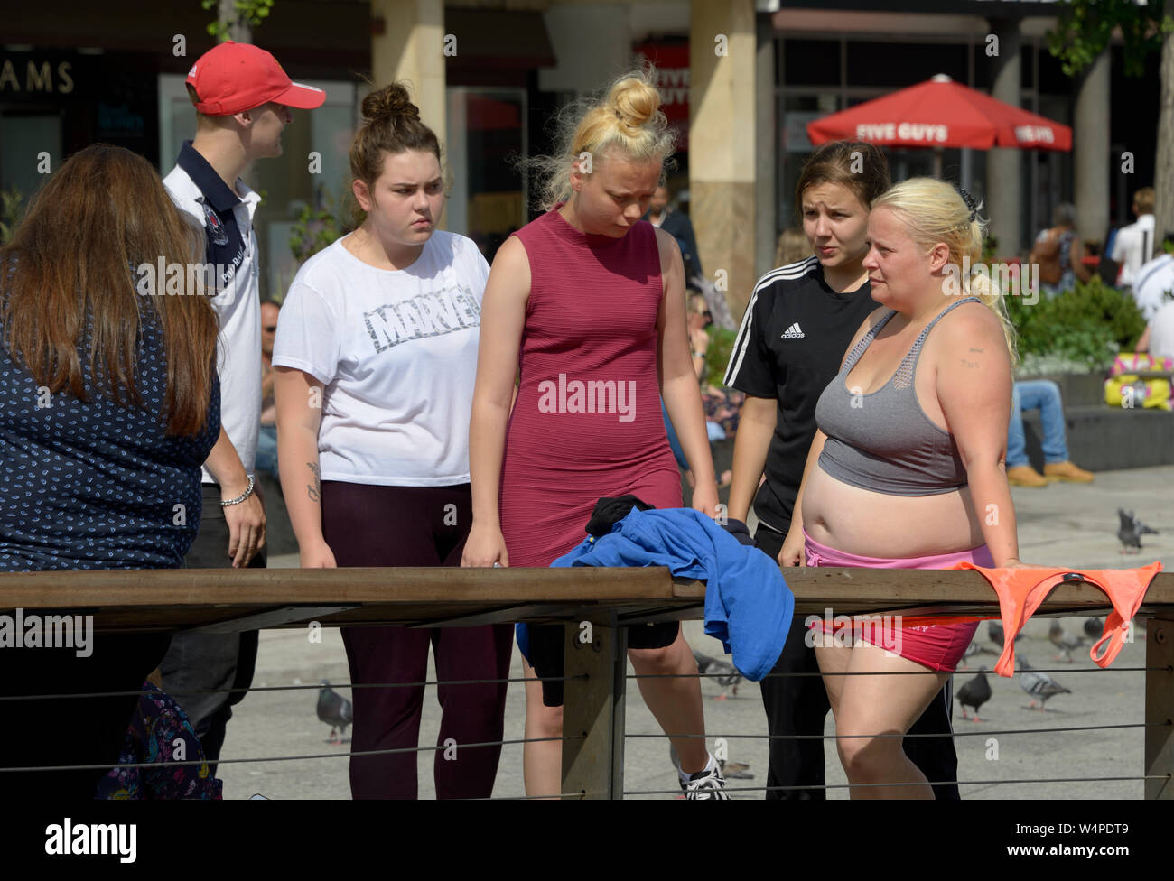 Strange group of young people, in the summer heatwave, Nottingham Stock ...