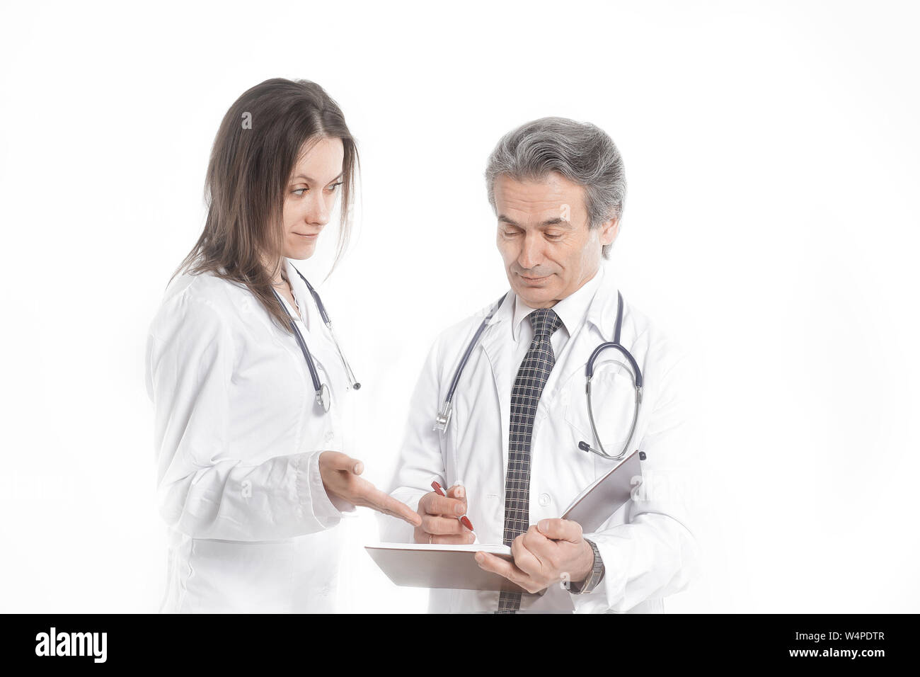 two physician discuss the diagnosis of the patient.isolated on white ...