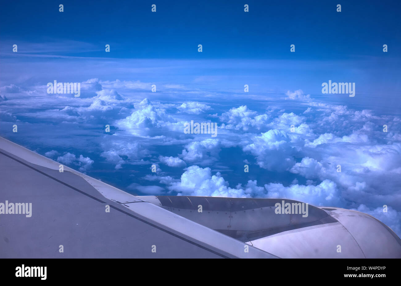 Look outside of the airplane window and see beautiful cloudy sky Stock ...
