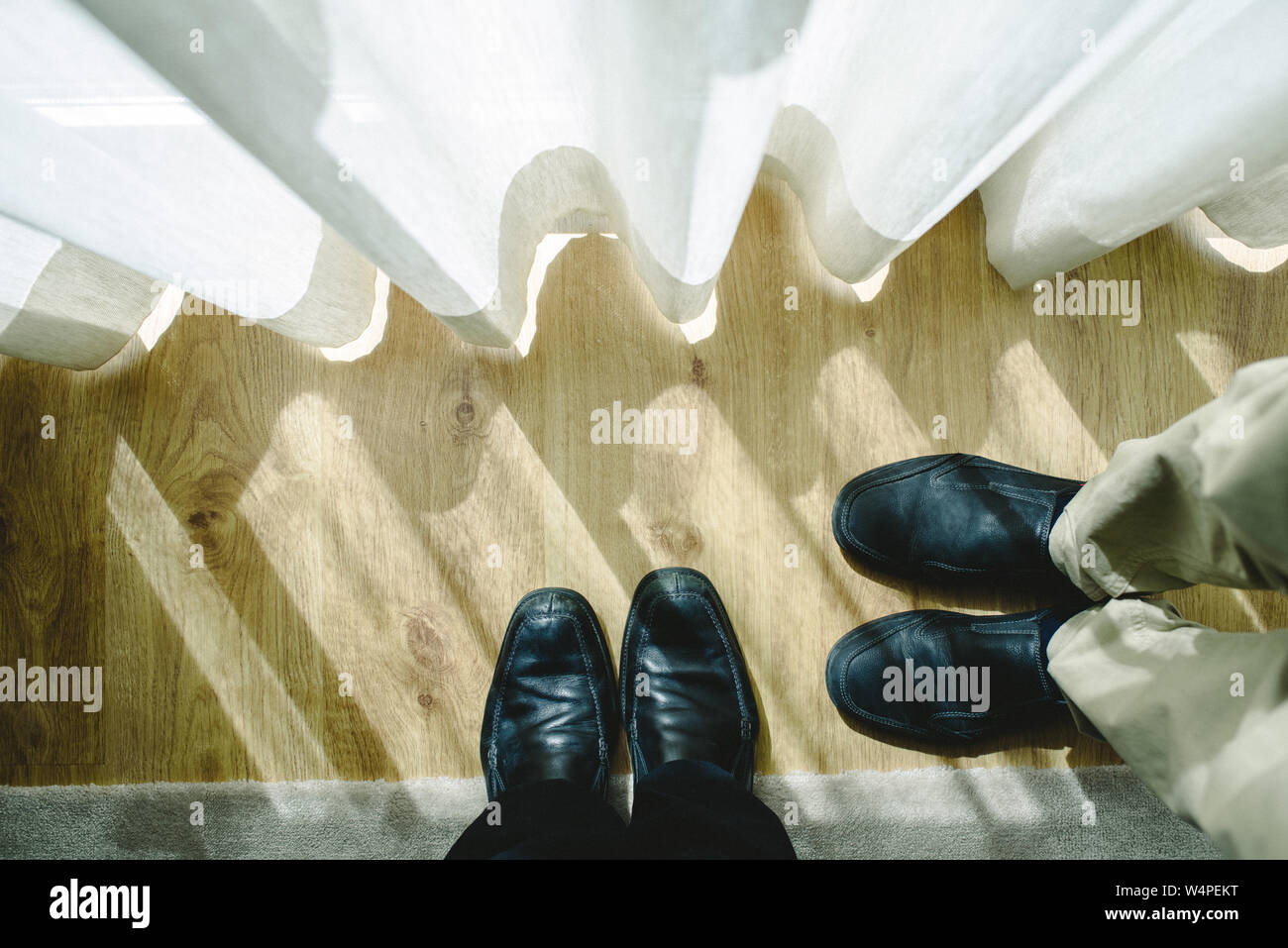 Pairs of shoes on white from above hi-res stock photography and images ...
