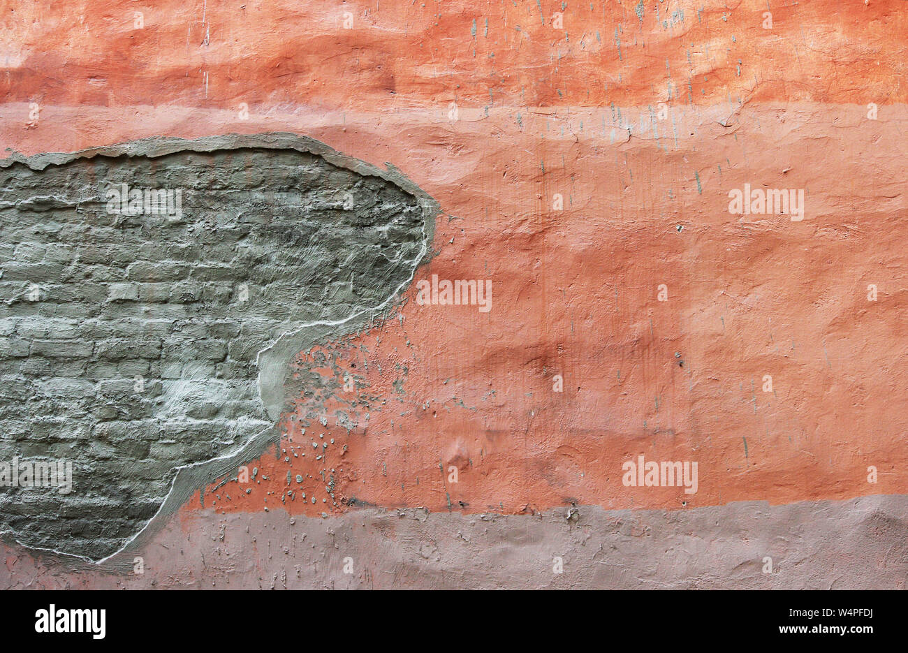 orange wall texture. plaster painted with different shades of orange ...