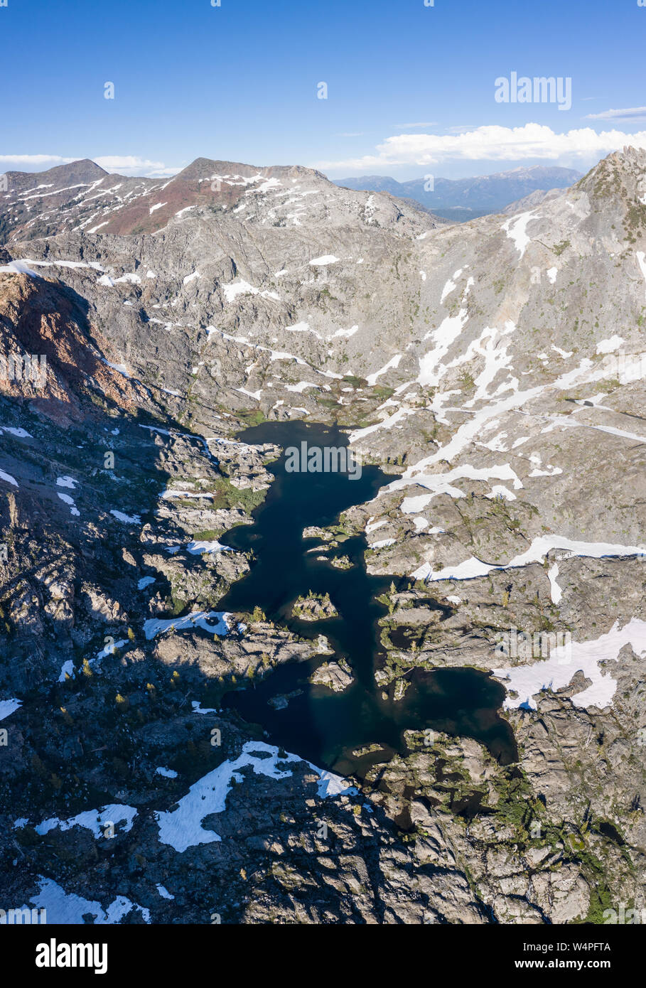 High granite mountains surround a beautiful lake in the Desolation ...